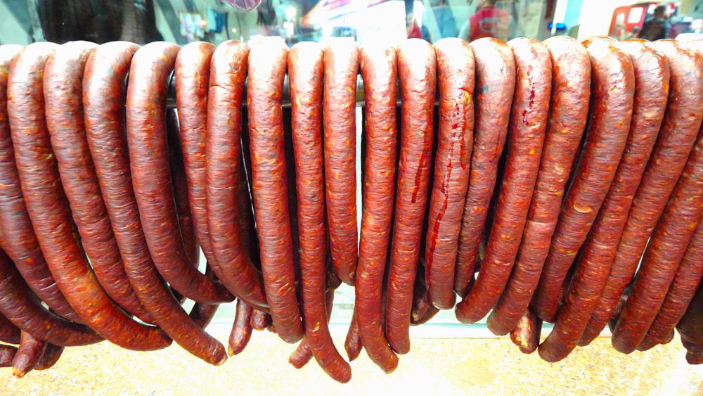 VIDEO: Eating Spicy Kosovo Sausage!! Sujuk & Tavas at Kulla e Zenel ...